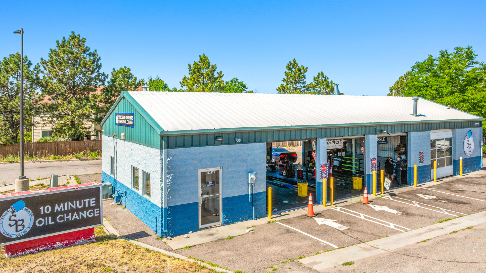 Strickland Brothers NNN Automotive Asset Centennial Colorado